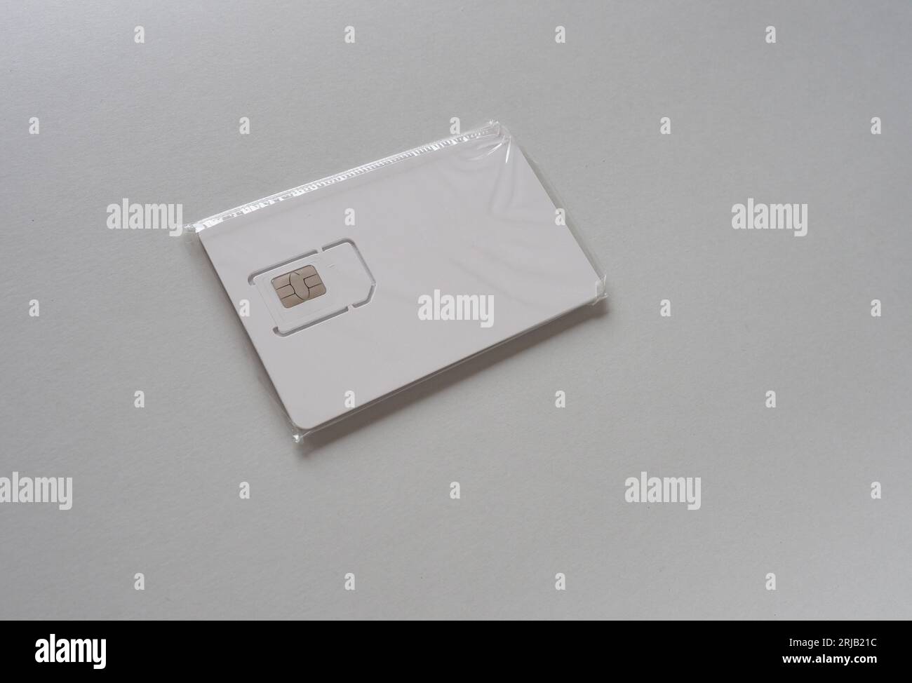 blank triple cut mini micro nano sim card with copy space Stock Photo ...