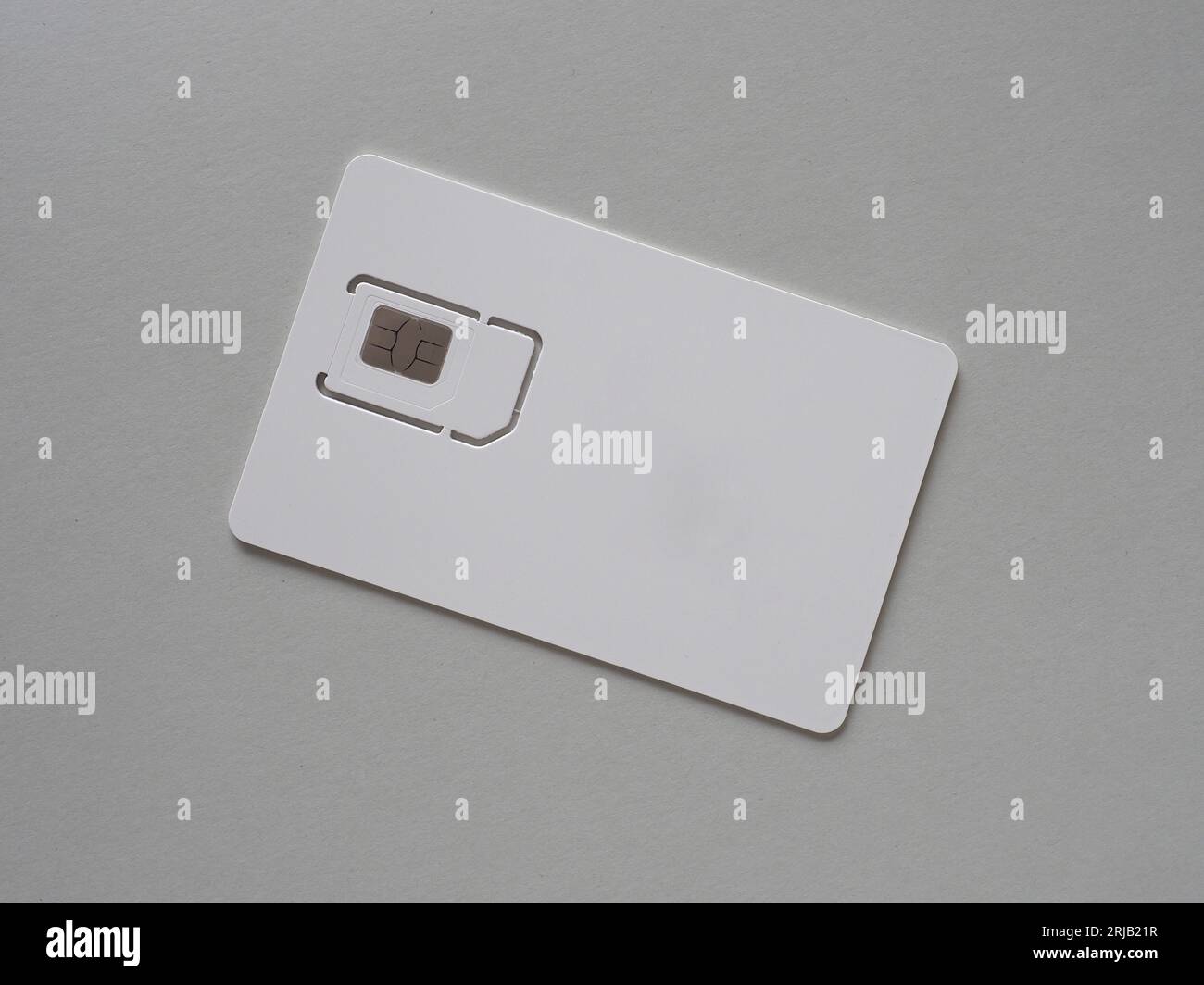 blank triple cut mini micro nano sim card with copy space Stock Photo ...