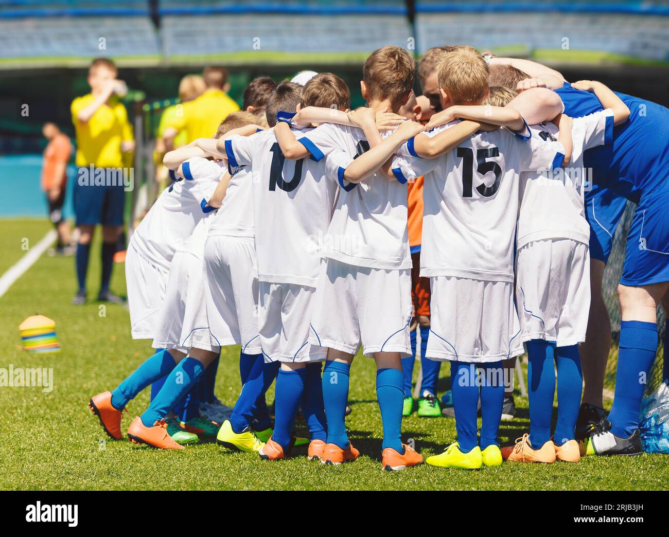 Kids Play Sports Game in the Stadium. Children Sporty Team United With ...