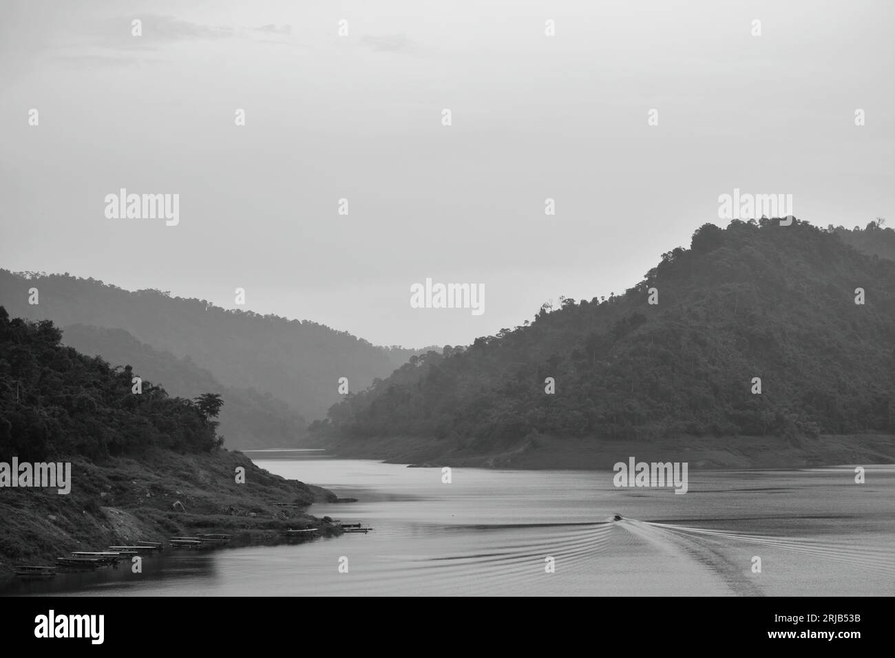 landscape of water reservoir lake with mountain background in sunset ...