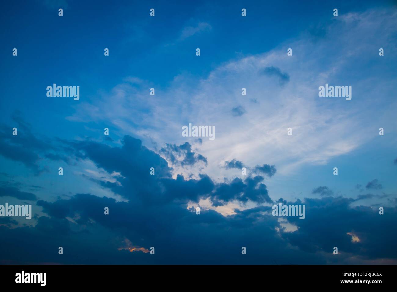 Sky and clouds before sunset background Stock Photo - Alamy
