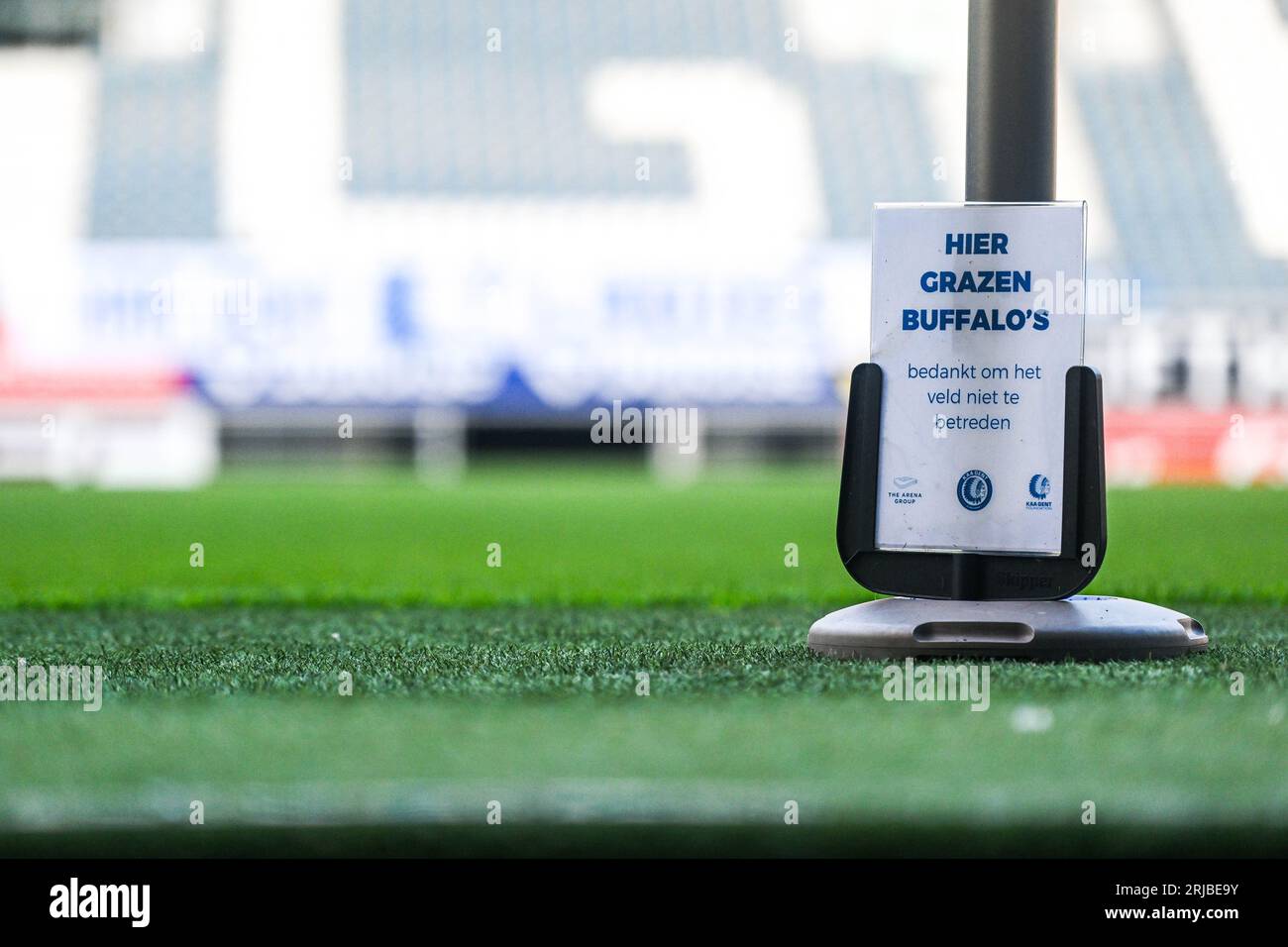 Gent, Belgium. 21st Aug, 2023. Sign next to the pitch : Hier grazen ...