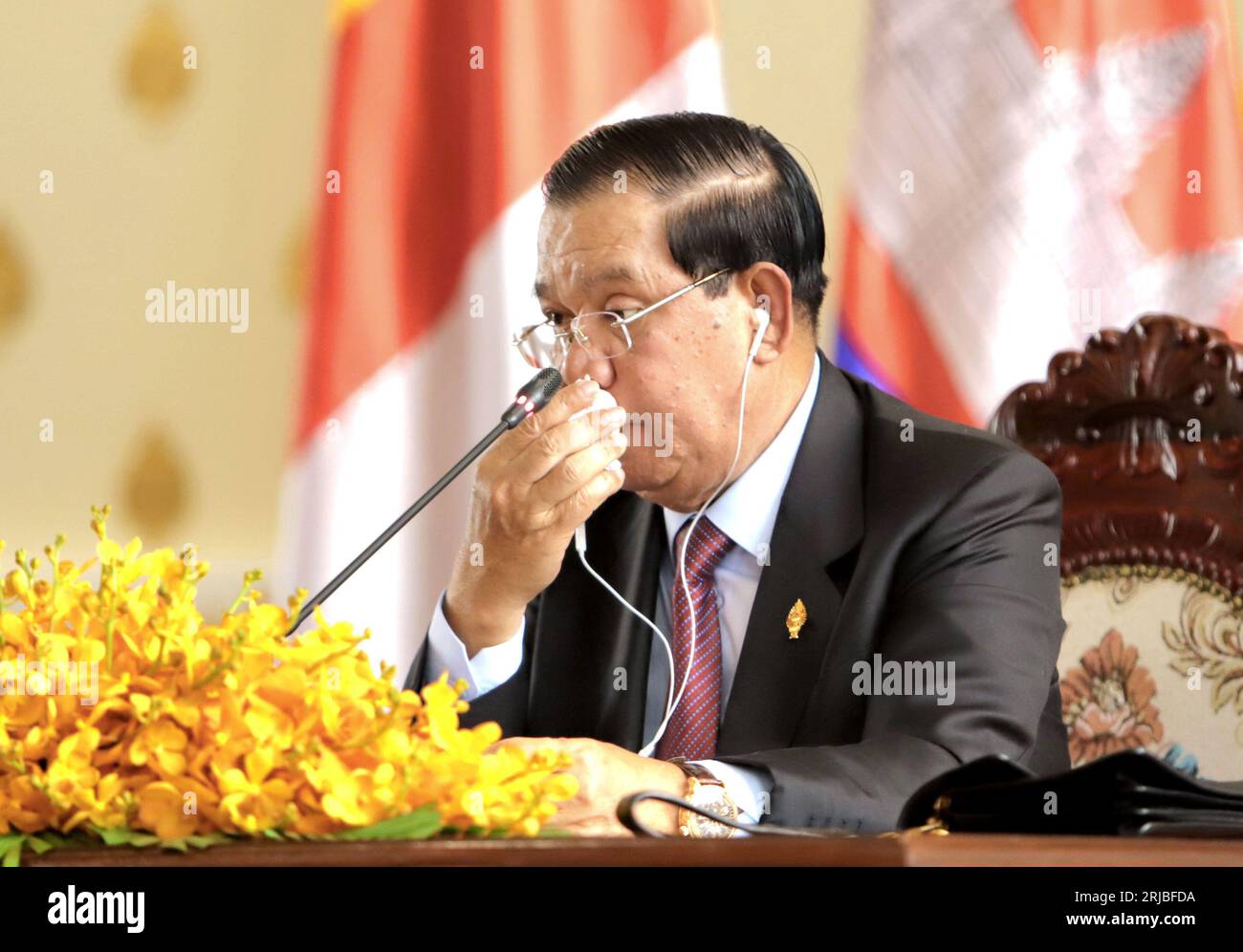 Former Cambodian Prime Minister Hun Sen reacts during a press ...