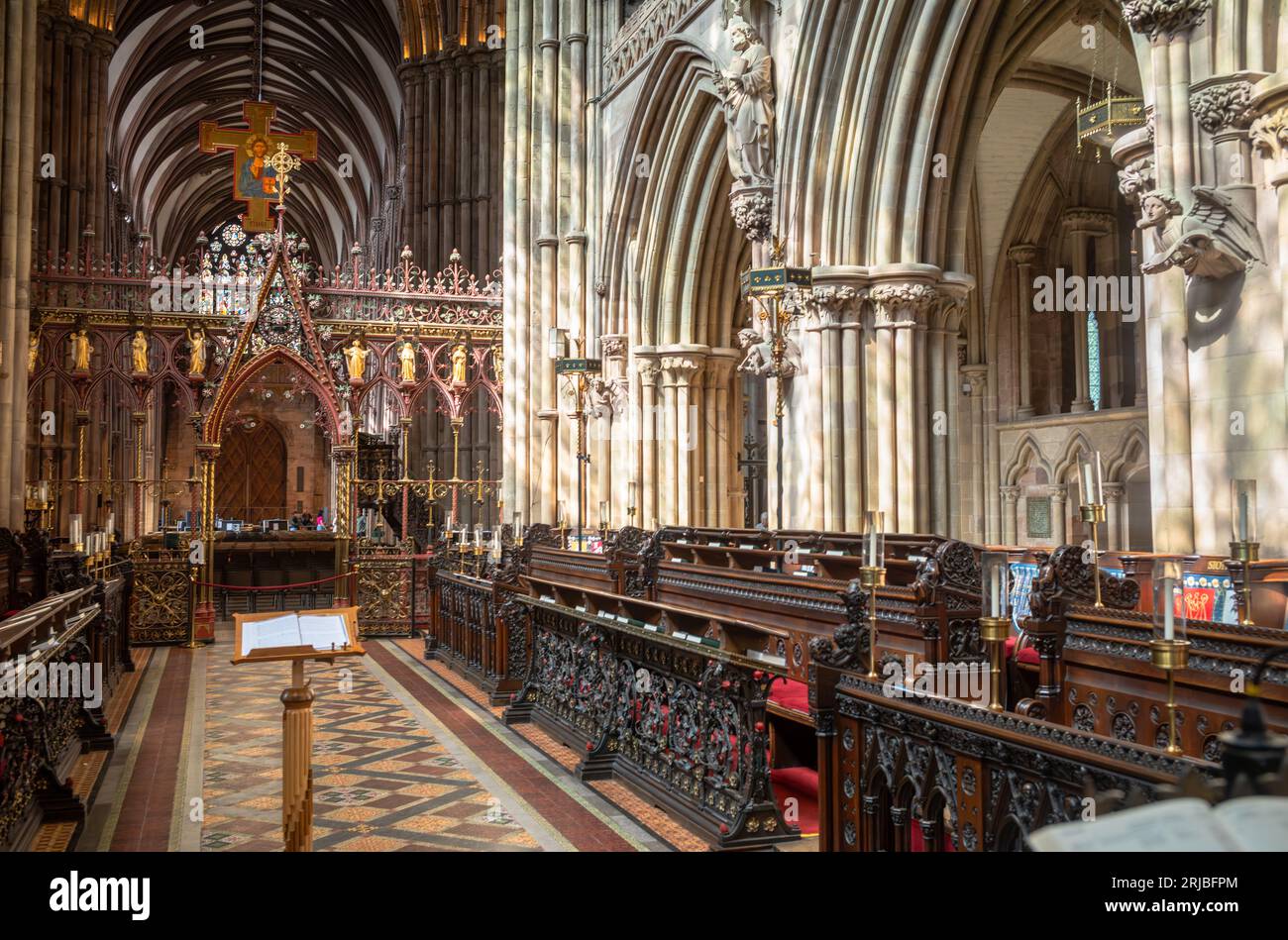 The ornate carved Choir Stalls behind the Choir Screen inside the ...