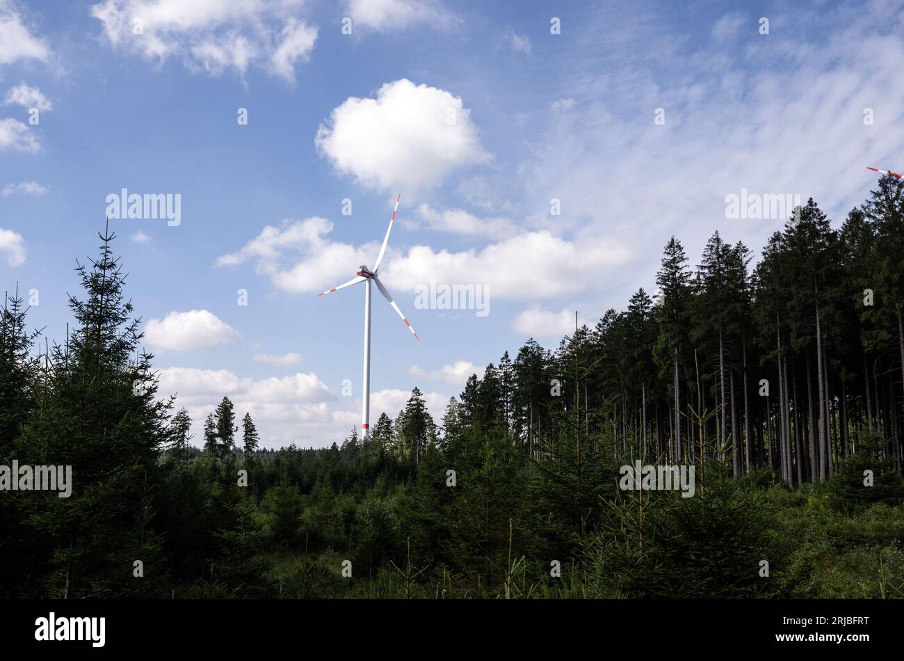 Simmerath, Germany. 22nd Aug, 2023. A wind turbine stands on the site ...