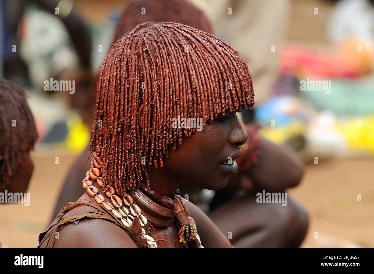 Hamer women, traditional hairstyle detail in Dimeka market. Debub Omo ...