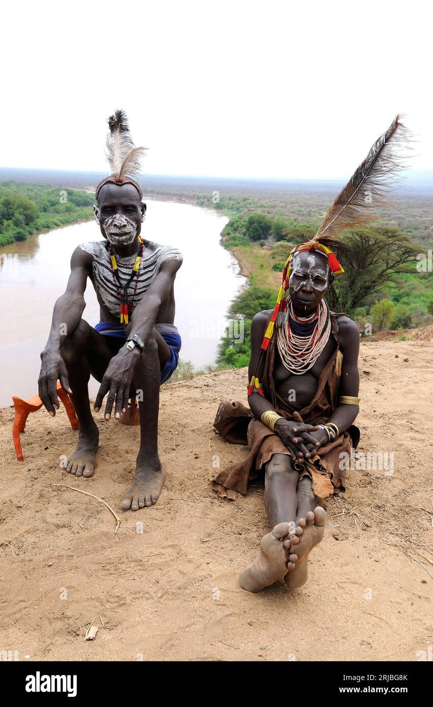 Karo couple with the Omo river in the background. Karo Village, Omo ...