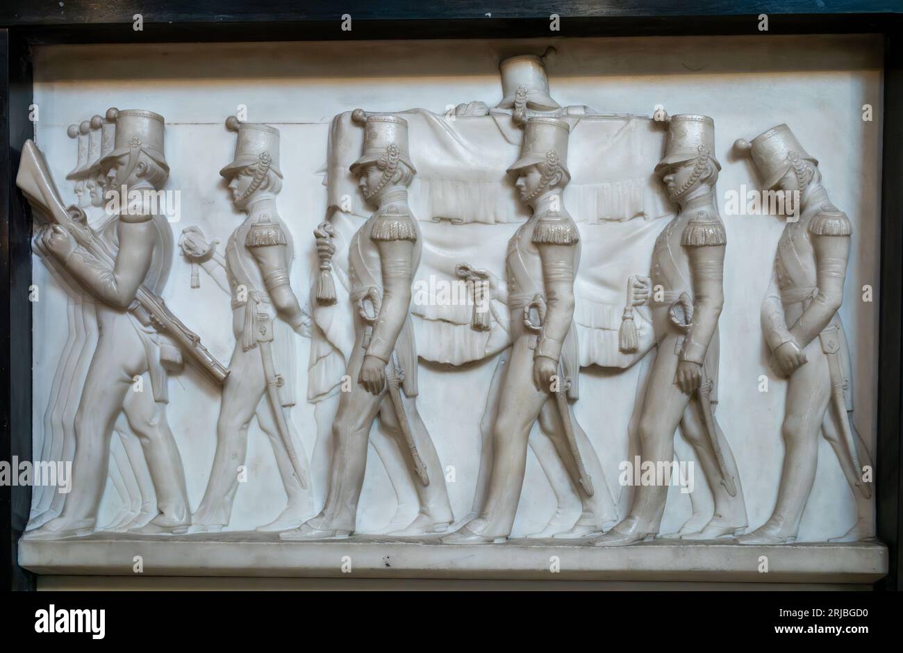 A high relief marble carving showing soldiers and a coffin on the side ...