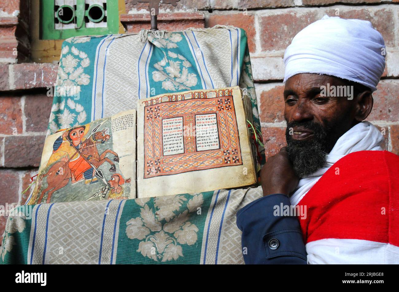 Monk showing Holy book in a Nakuta Laab monastery. Lalibela, Amhara ...