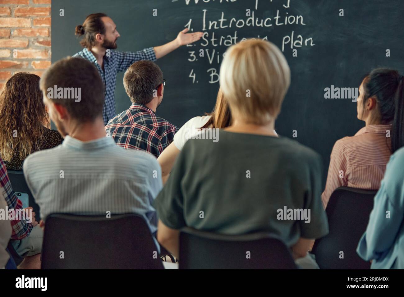 Presenter, happy, successful male expert, speaker talking, teaching to ...