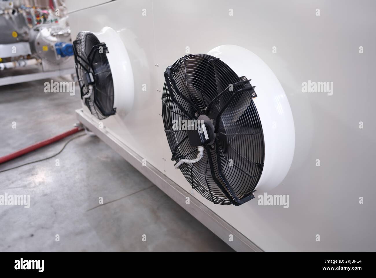 Cooling industrial air conditioners and fans closeup Stock Photo - Alamy