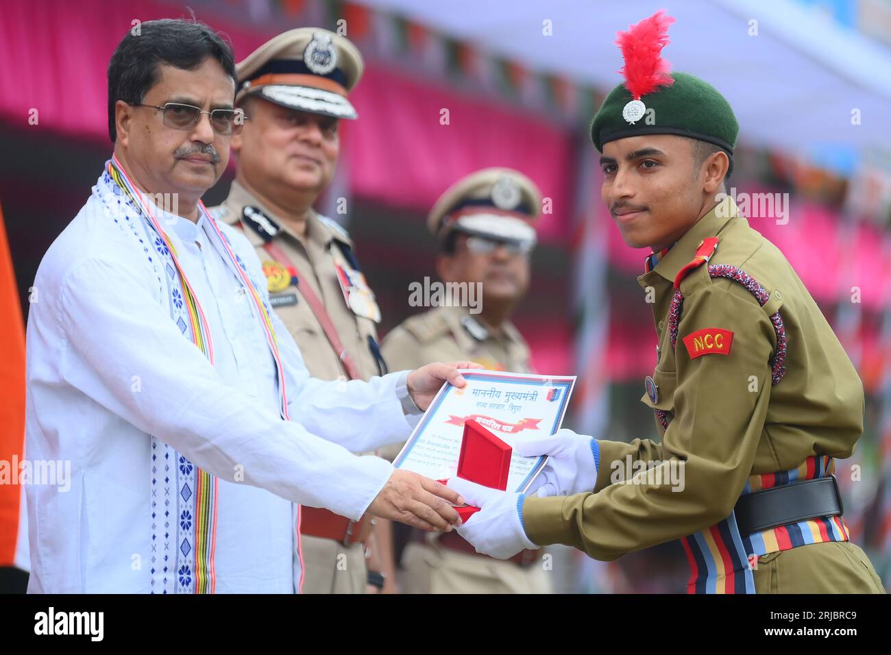 Tripura Chief Minister Manik Saha distributes awards and medals to the ...