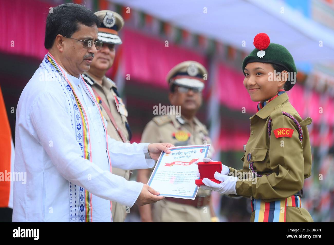 Tripura Chief Minister Manik Saha distributes awards and medals to the ...