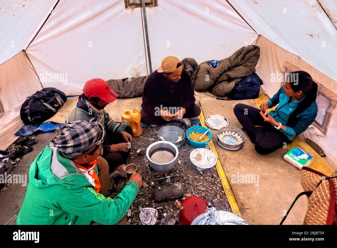 Making momos in the cook tent on an expedition to Zanskar, Ladakh ...