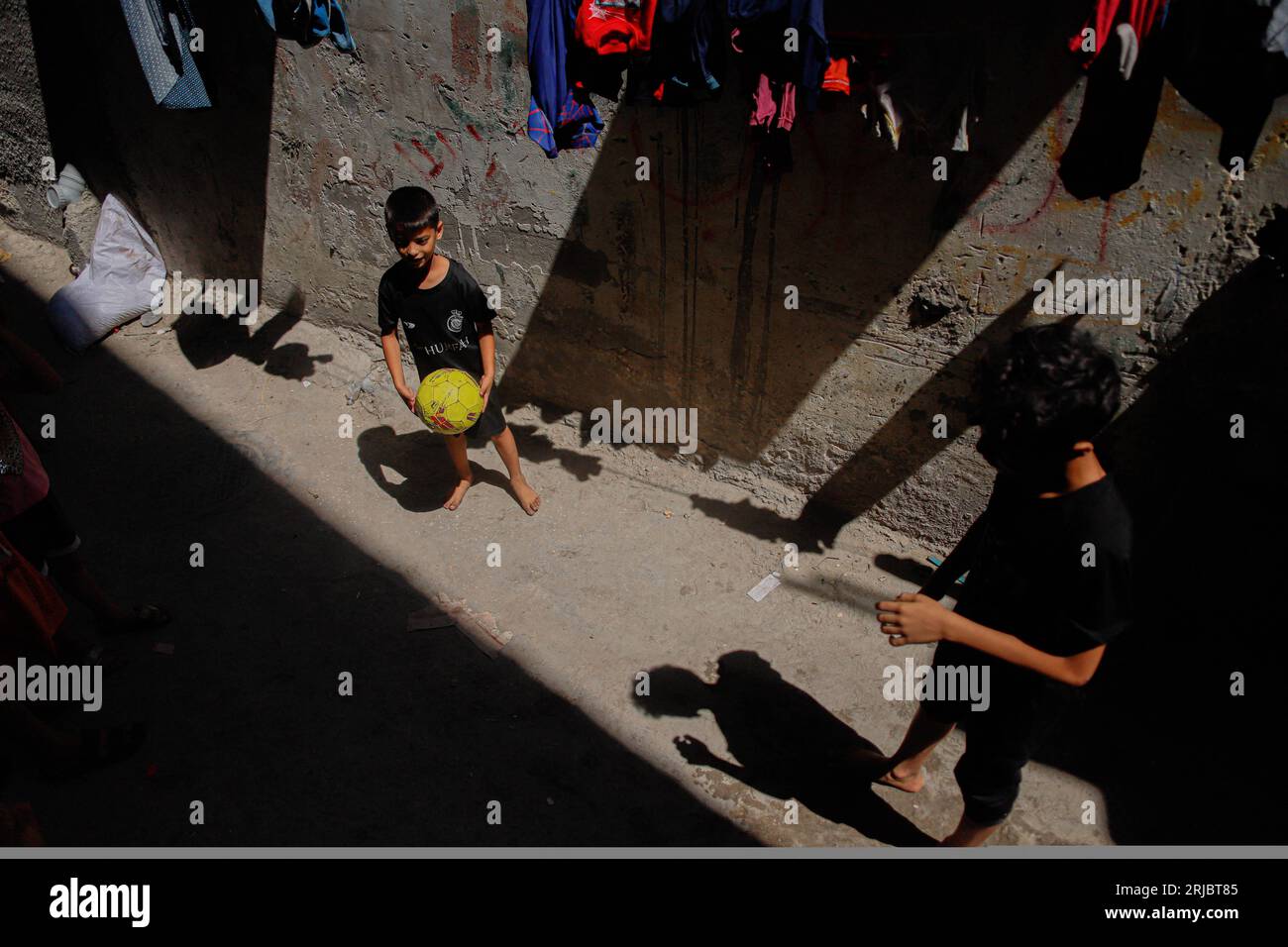 Gaza City, Palestine. 22nd Aug, 2023. Palestinian children play ...