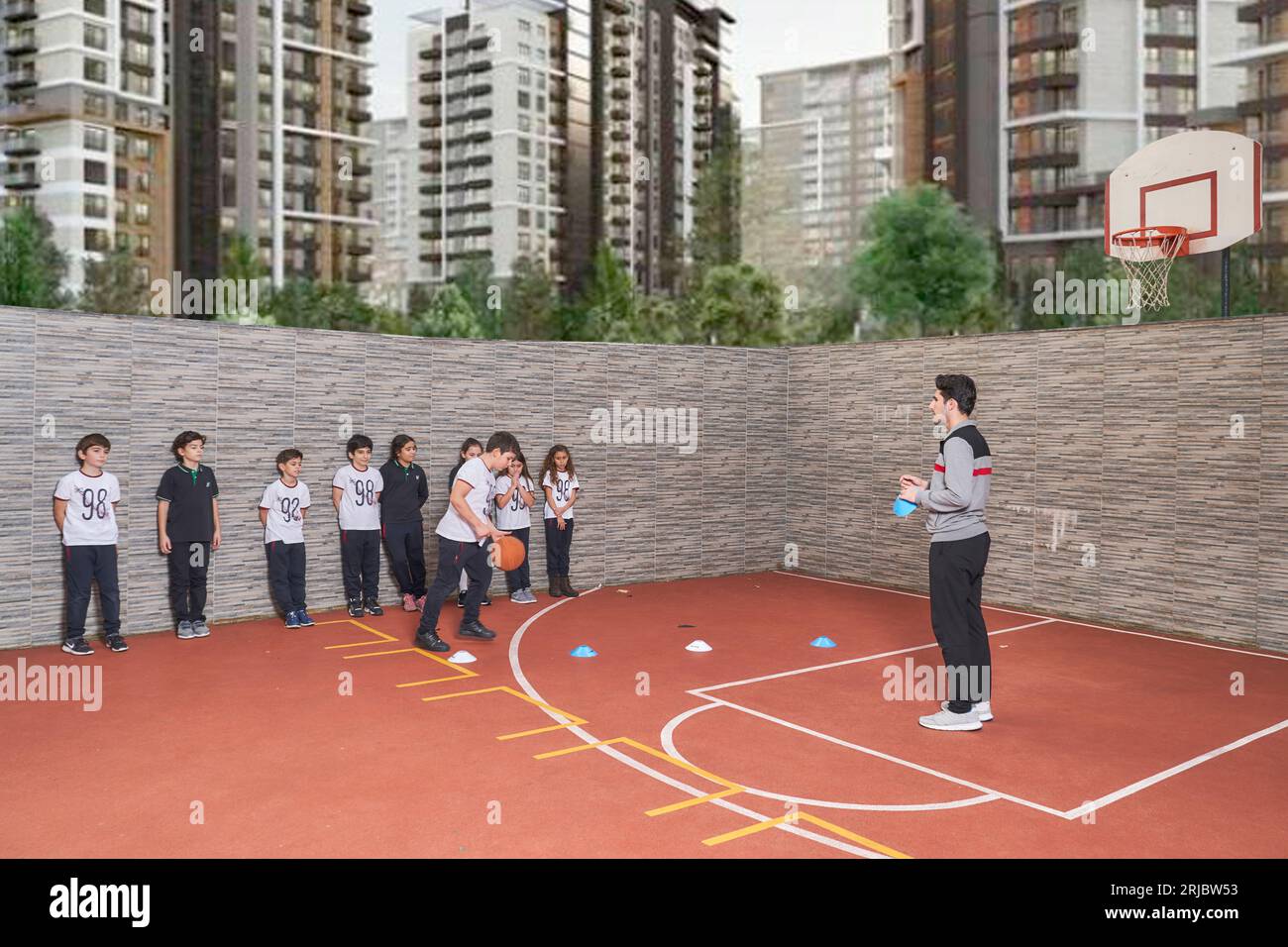 the teacher teaches to a class full of elementary boys and girls ...