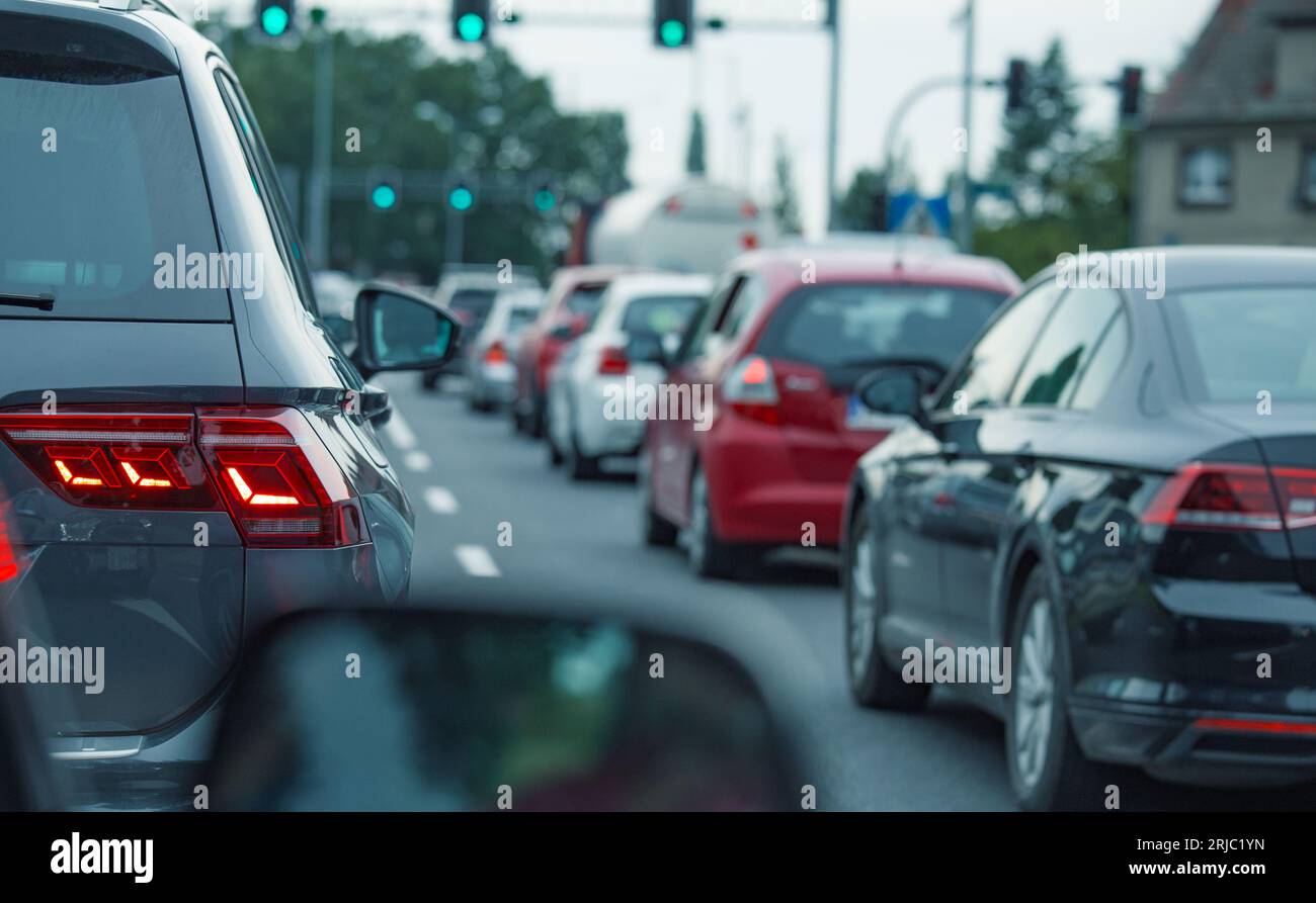 Traffic jam in the city cars waiting at traffic light Stock Photo - Alamy