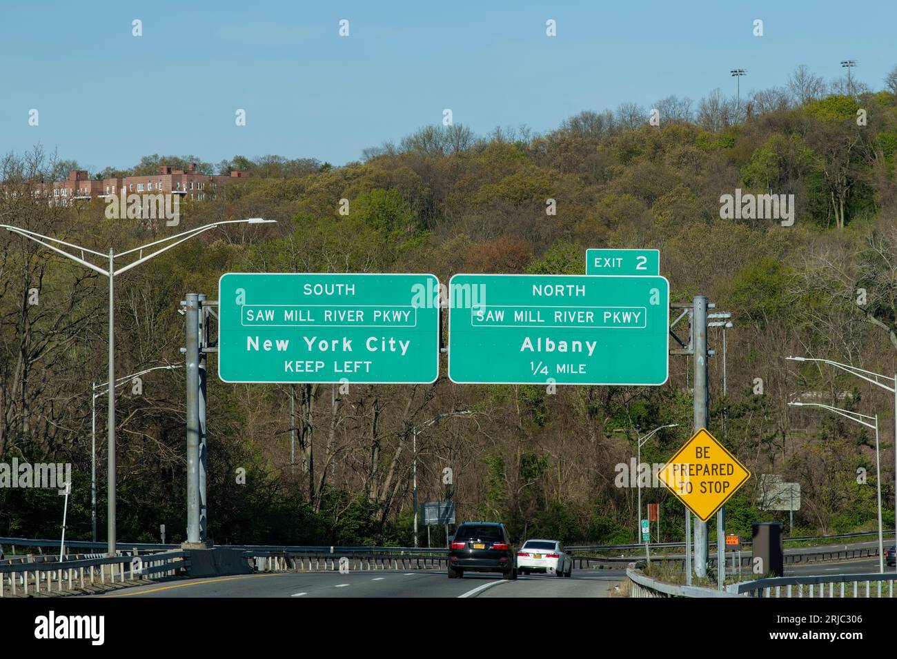 NY, USA-May 2022; View over highway with overhead road signs at exit 2 ...
