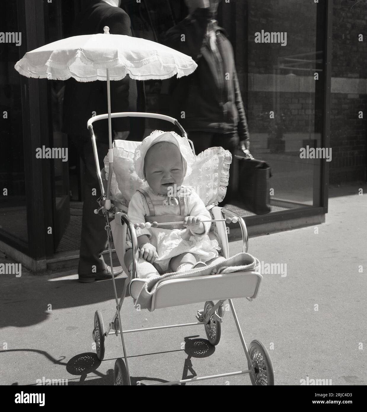 1960s, historical, summer in the city.... outside on a pavement, an ...