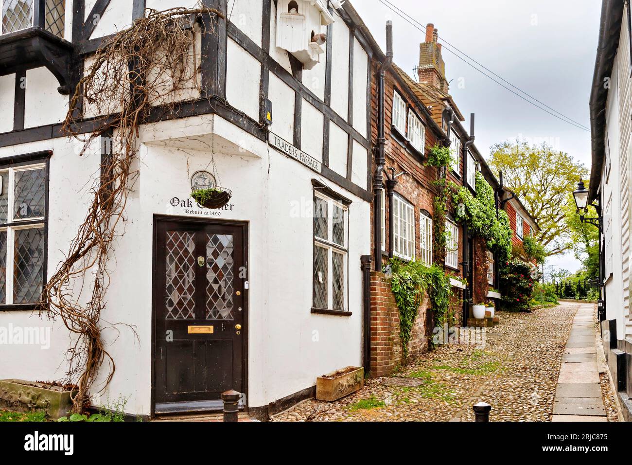 Medieval houses in Traders' Passage, a cobbled alleyway in historic ...