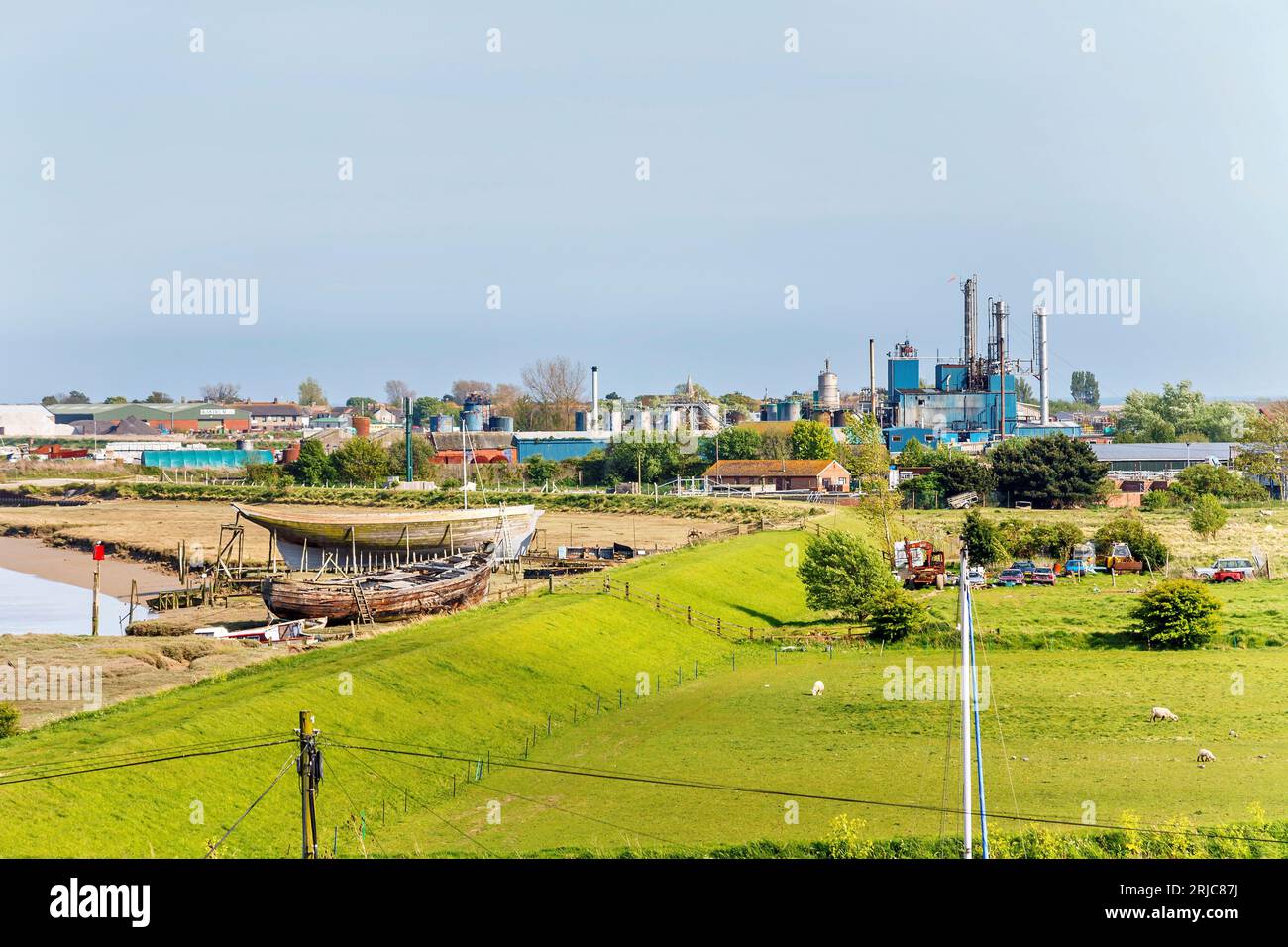 View over Rye Harbour to an industrial landscape at Rye Wharf and the ...