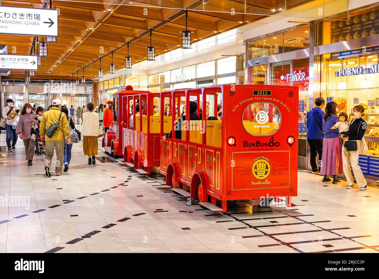 Oita, Japan - Nov 26 2022:The famous Japanese toy train, Bun Bun Go, operated inside the central ...