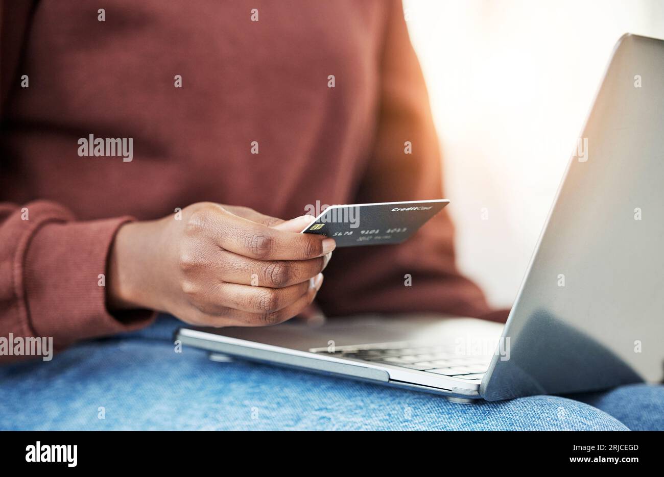 Closeup, woman and hand with a laptop, credit card or online shopping ...