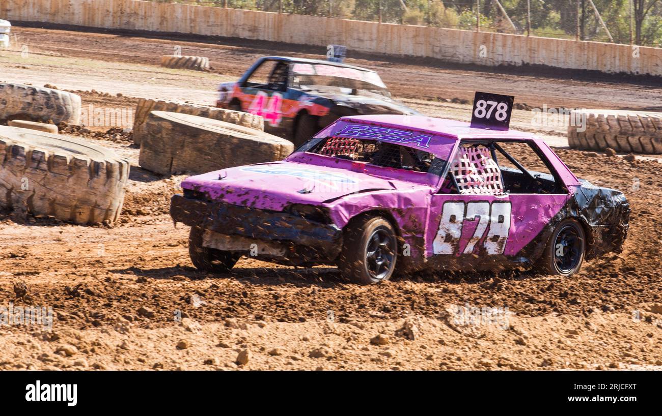 Dirt track racing with amateur stock cars. Heaps of lying mud as the ...