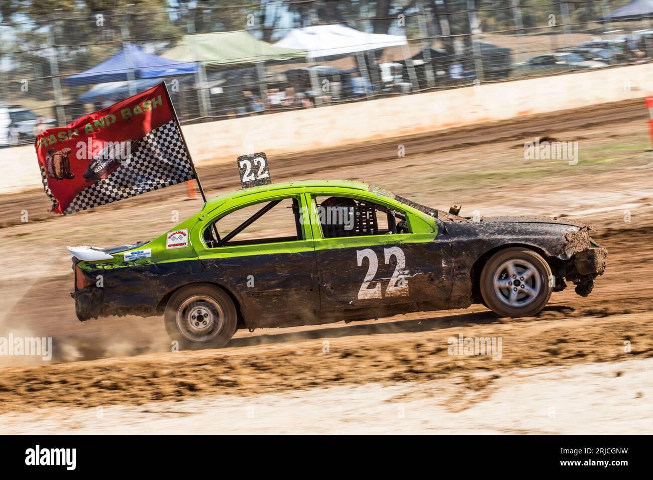 Dirt track racing with amateur stock cars. Heaps of lying mud as the ...
