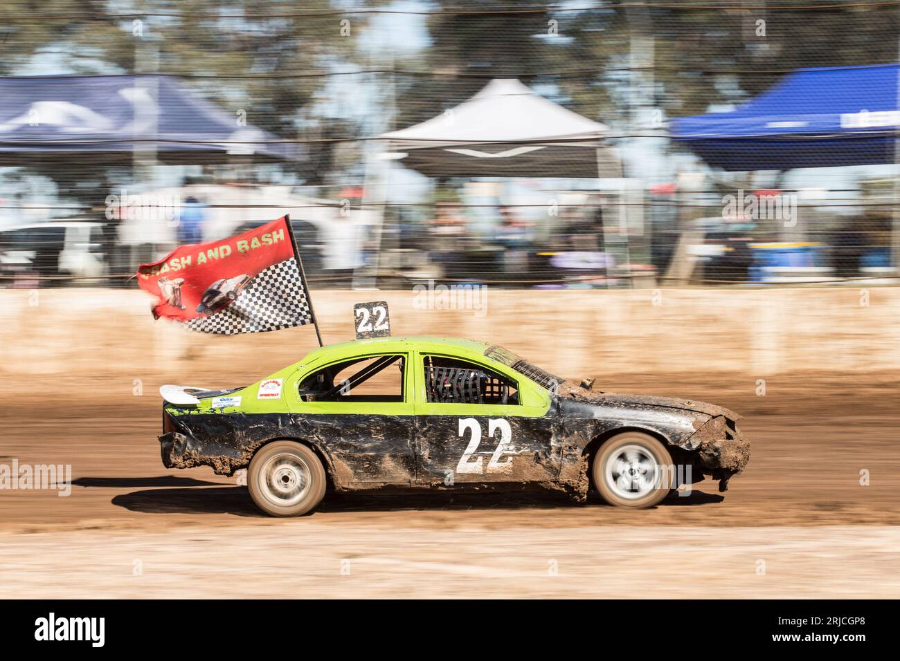 Dirt track racing with amateur stock cars. Heaps of lying mud as the ...