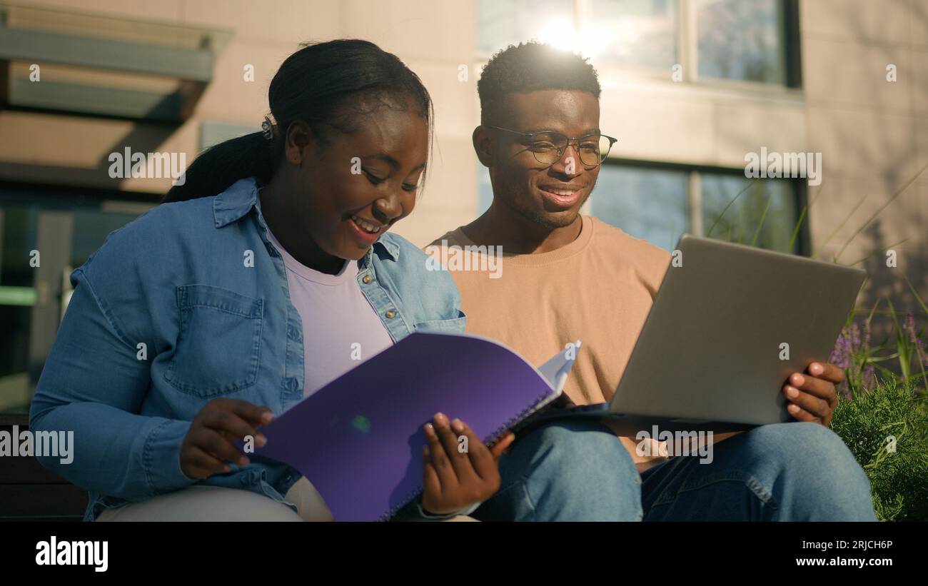 Classmates project outside laptop hi-res stock photography and images ...