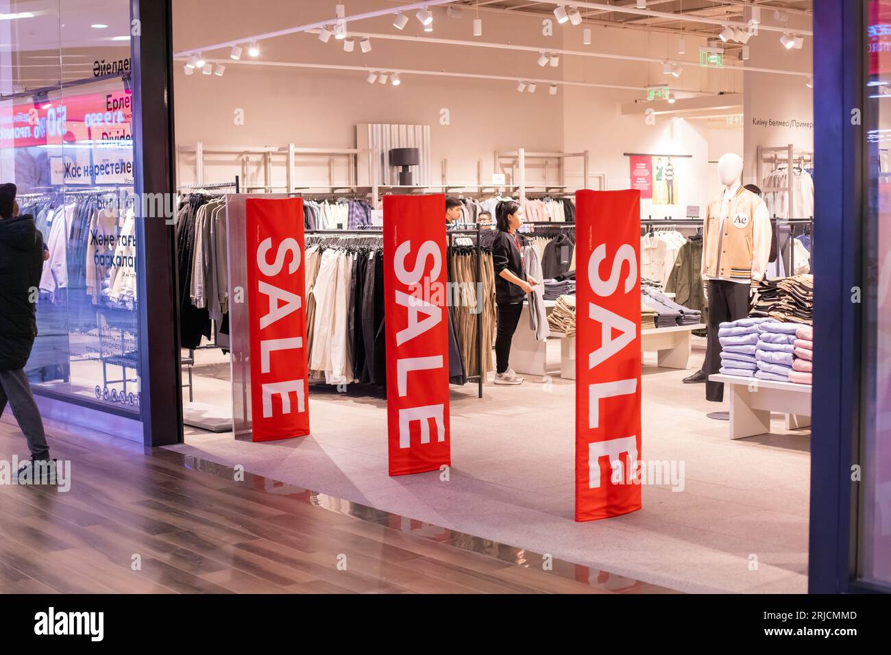 large red sale panels, big red sale sign at entrance store in shopping ...