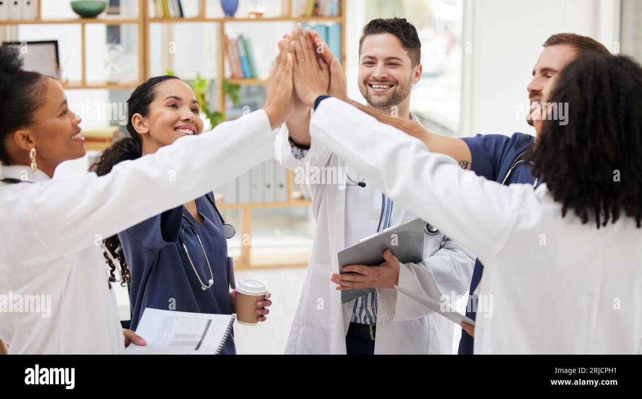 Doctors, teamwork and high five in meeting, motivation or success in ...
