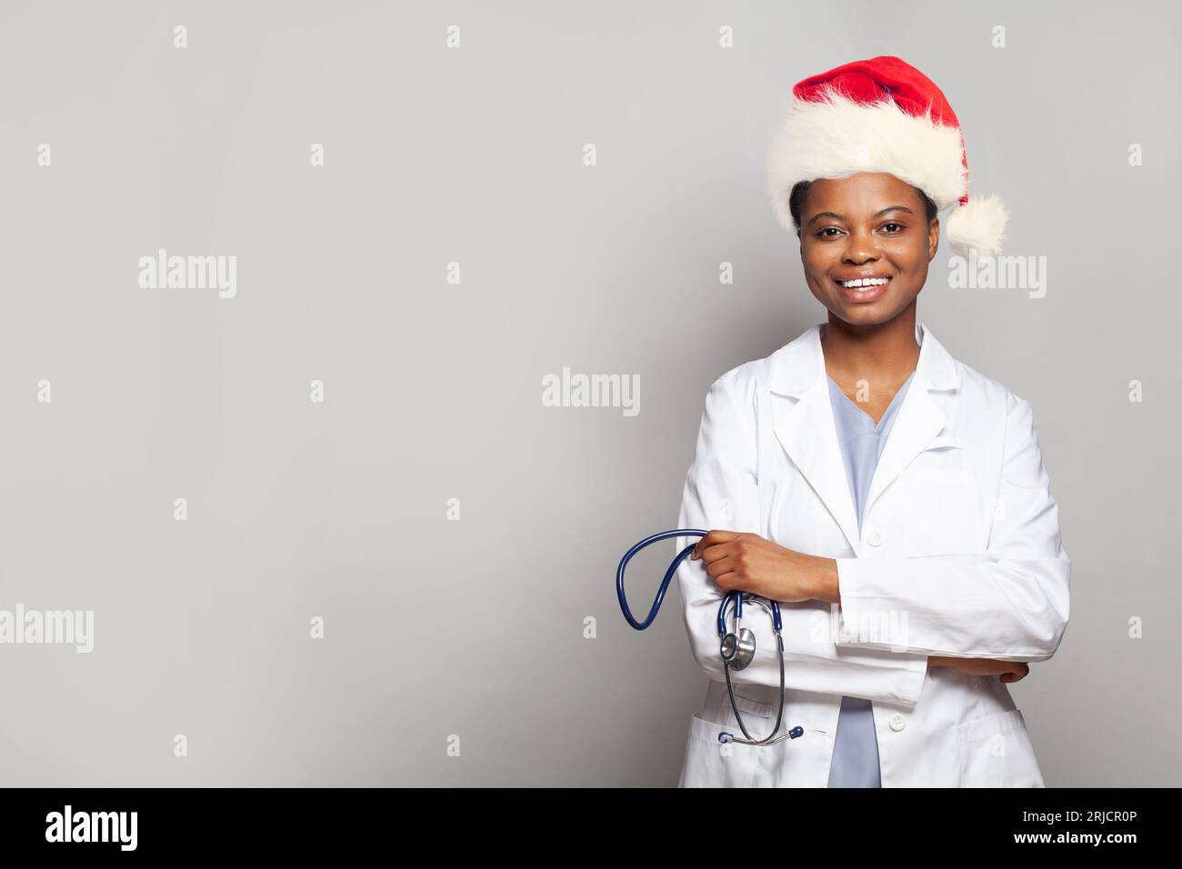 Attractive doctor woman christmas hat hi-res stock photography and ...