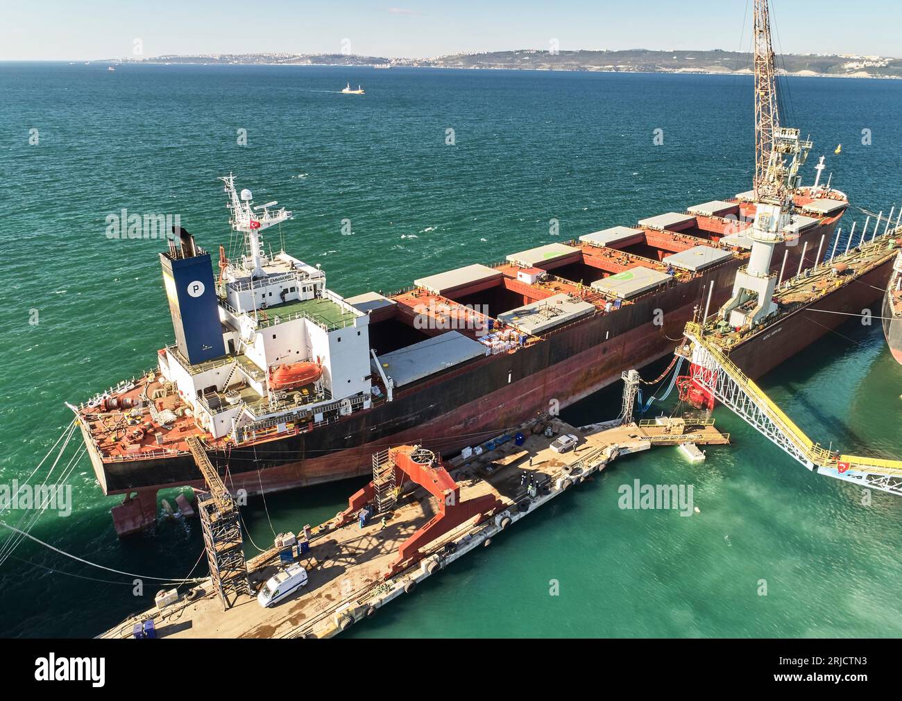 ship with container on shipping port for import export. import export ...