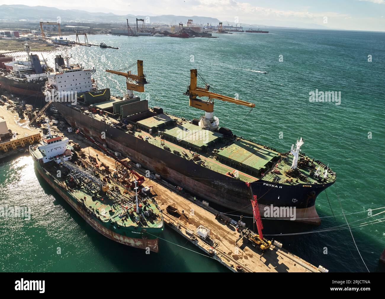 ship with container on shipping port for import export. import export ...