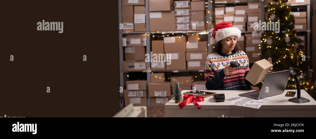 Scanning barcode on delivery parcel. Worker scan barcode of cardboard ...