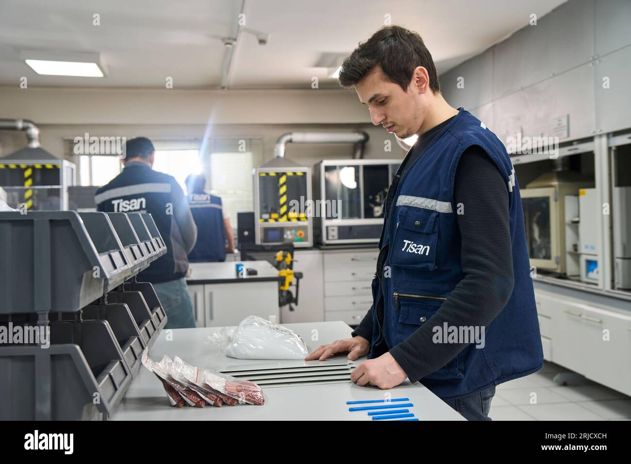 people Working in the laboratory of a modern factory. quality ...