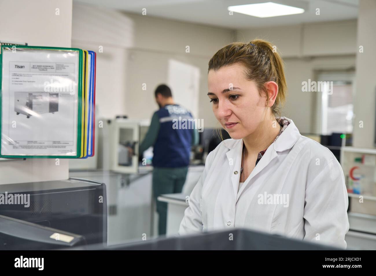 people Working in the laboratory of a modern factory. quality ...