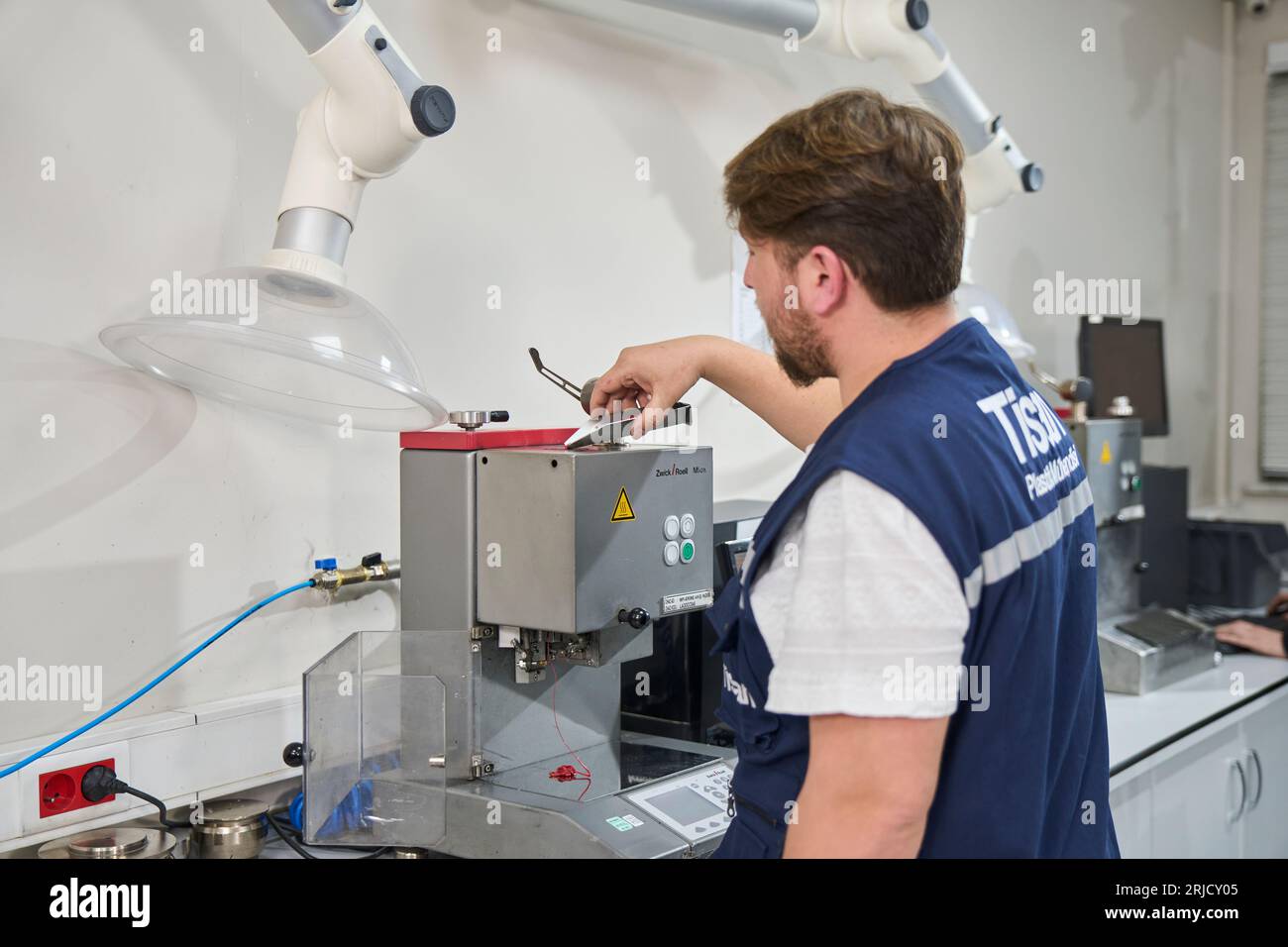 people Working in the laboratory of a modern factory. quality ...