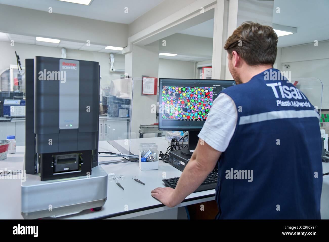 people Working in the laboratory of a modern factory. quality ...