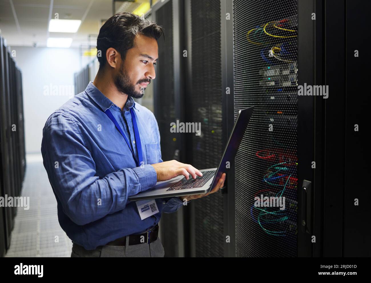Man Engineering Laptop And Data Center Server Room Inspection Or System Solution Coding And