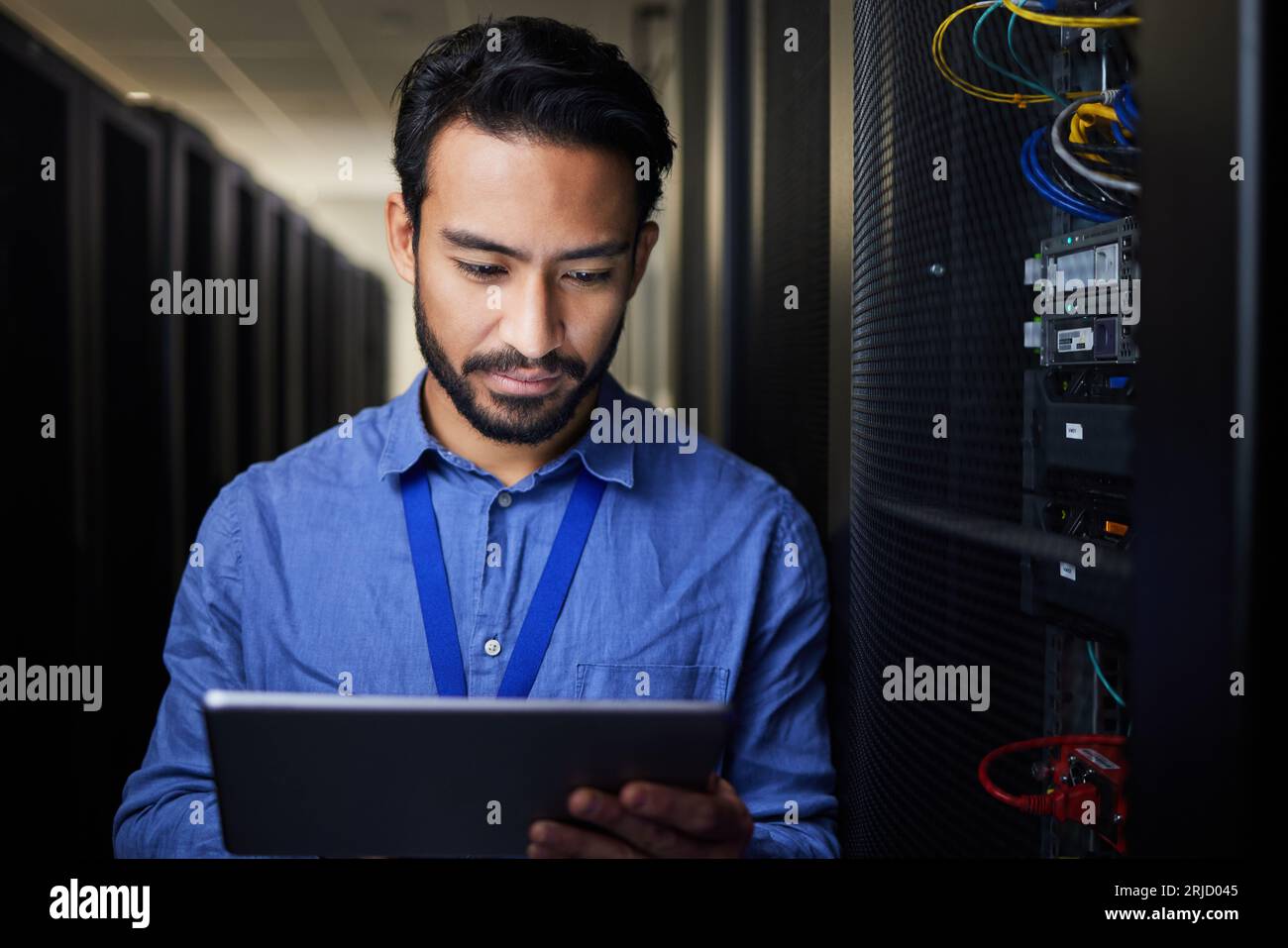 Data center admin typing on hi-res stock photography and images - Alamy