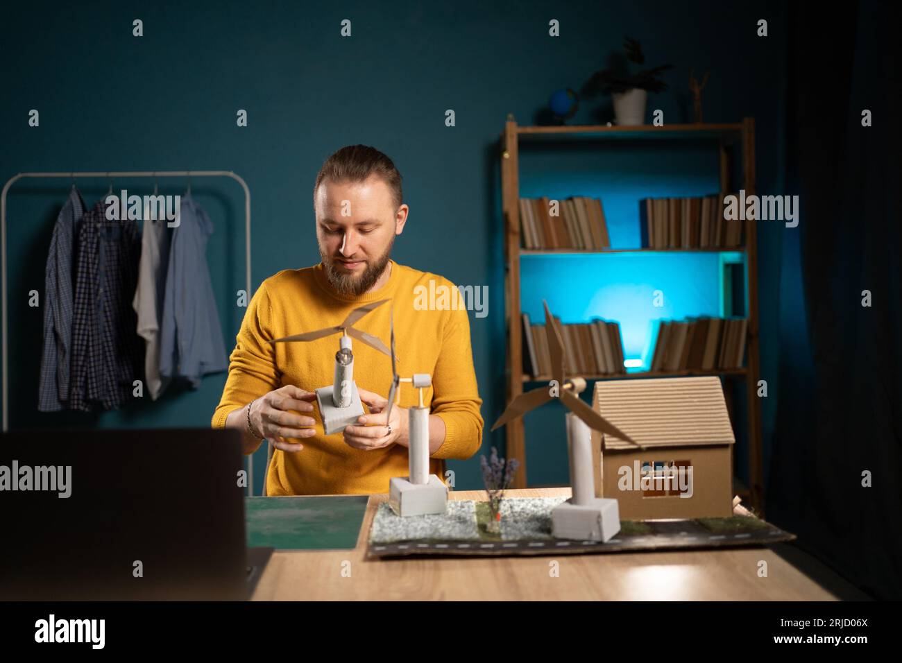 Wind energy engineer designing 3d project for residential district ...