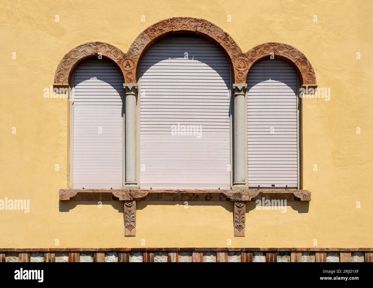 Sunny scenery showing a window with closed jalousie seen in Salo, a ...