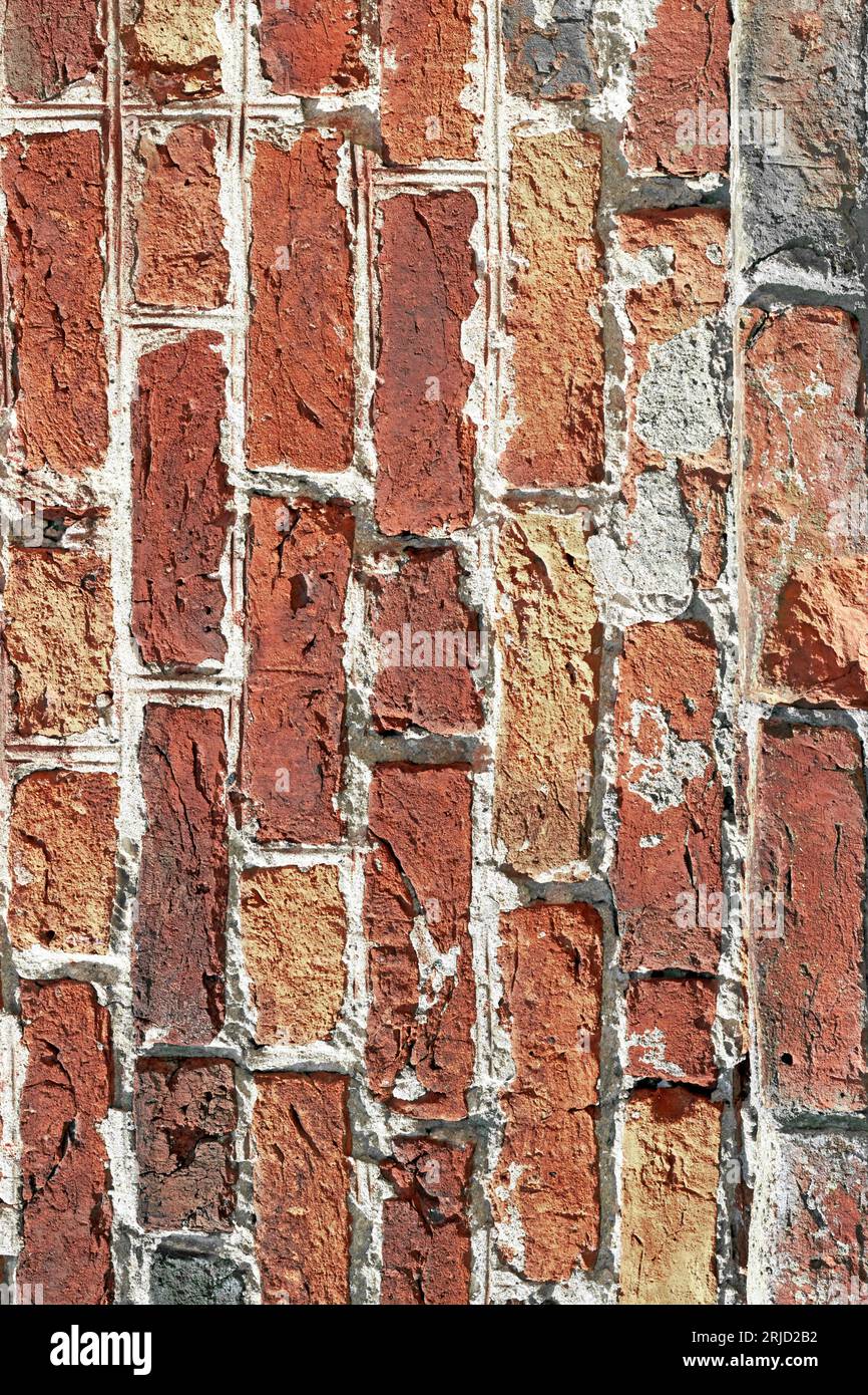 The wall is made of old red burnt ceramic bricks. High quality ...