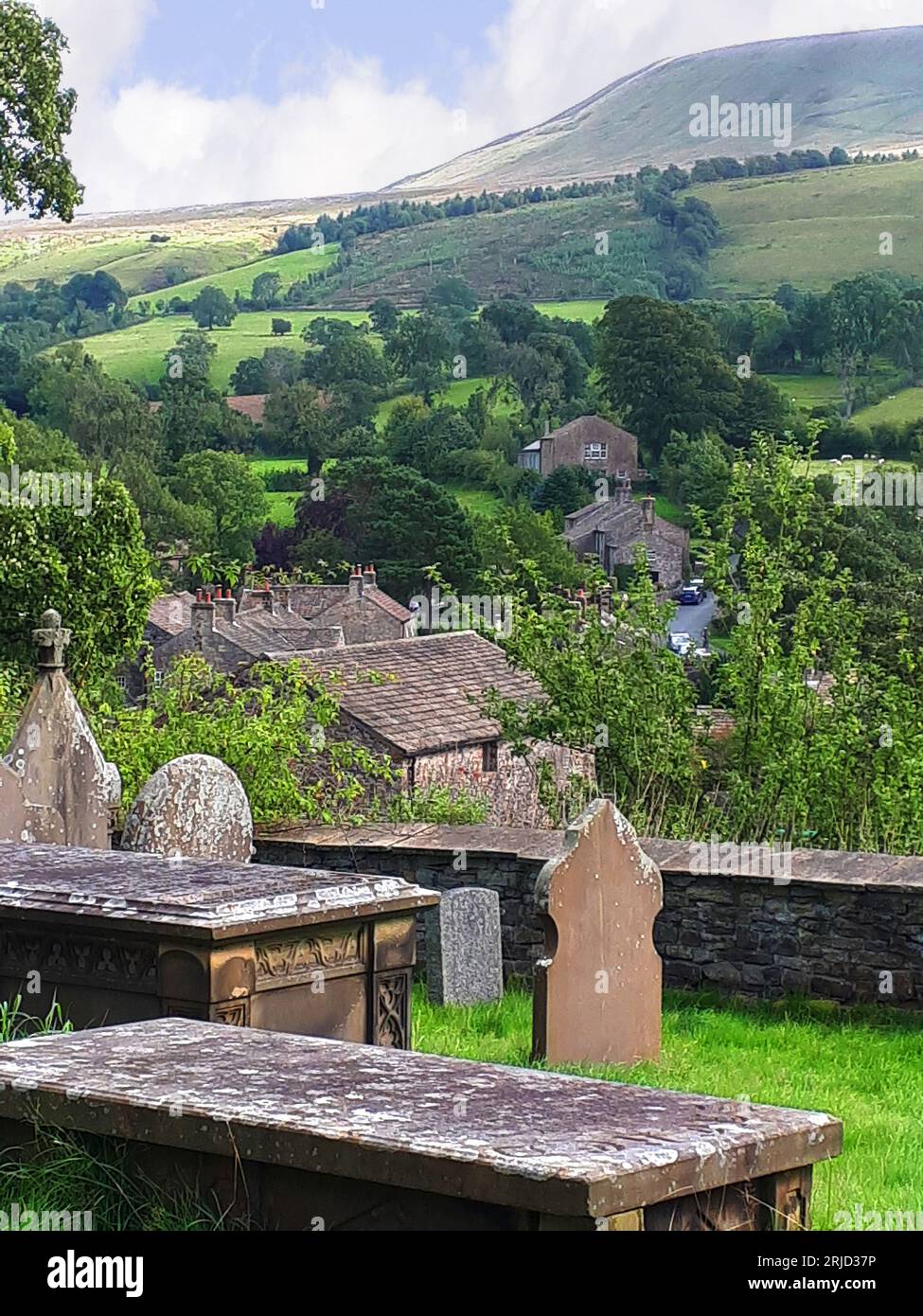 Downham in the shadow of pendle hill is a feudal village in Lancashire ...