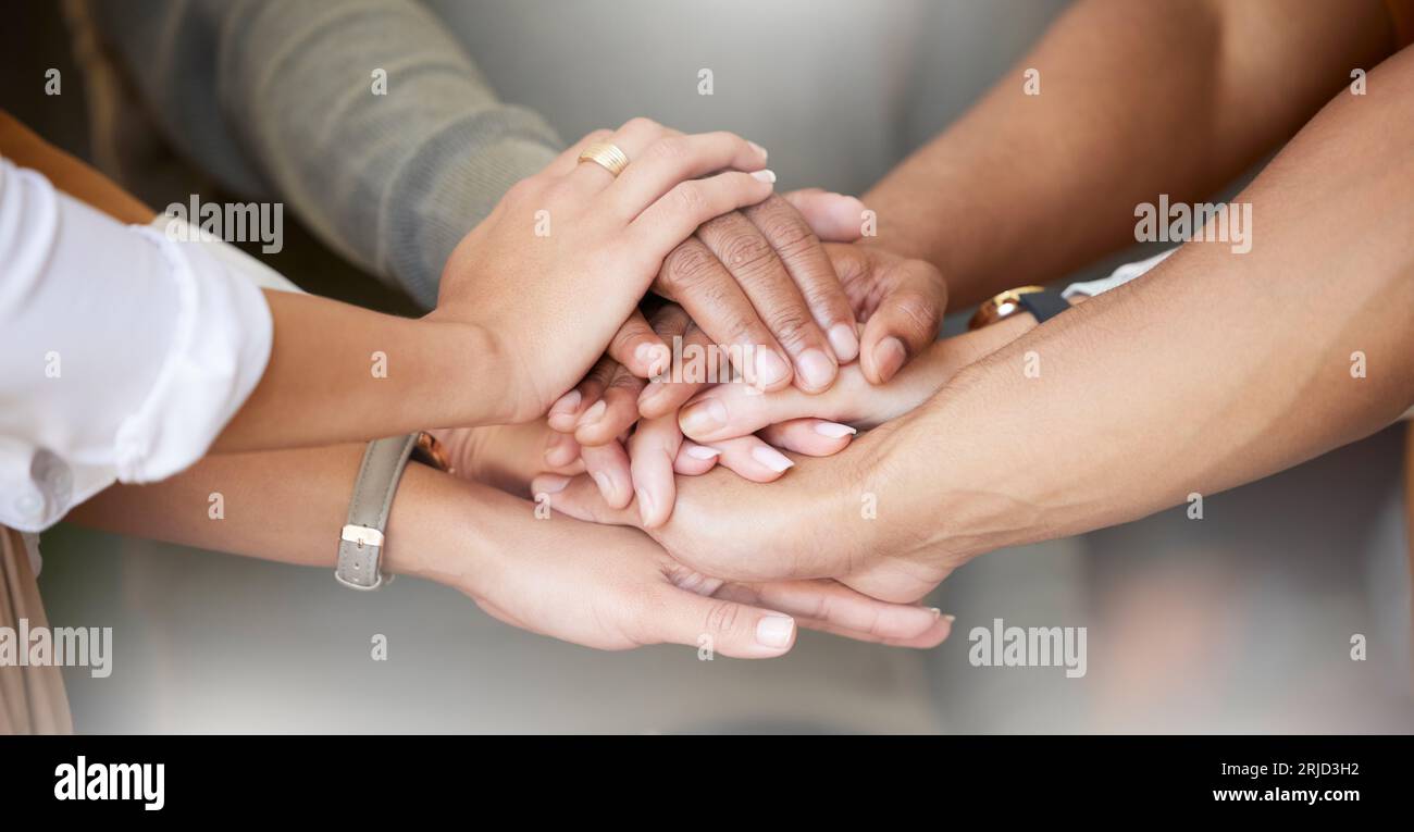 Office, teamwork and hands together in huddle for team building, collaboration and motivation at ...