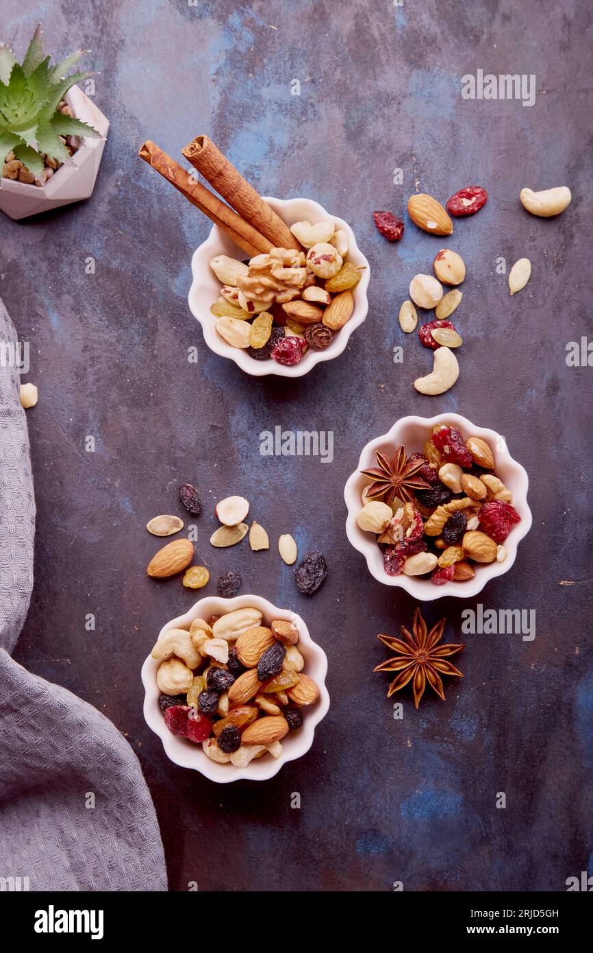 Aesthetic saucers with mixed nuts. Healthy food and snacks. Walnuts ...