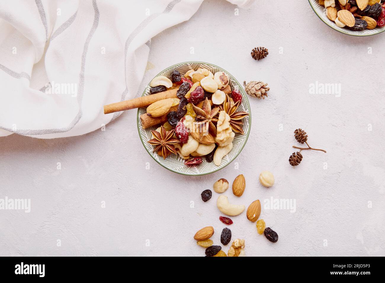 Aesthetic saucers with different nuts top view. Walnuts, almonds ...